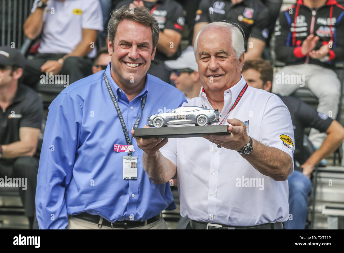 Mark Reuss of Chevrolet presents Roger Penske with a special ...