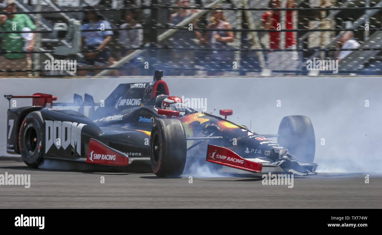 Mikhail Aleshin hits the wall in turn one during the 100th running of ...