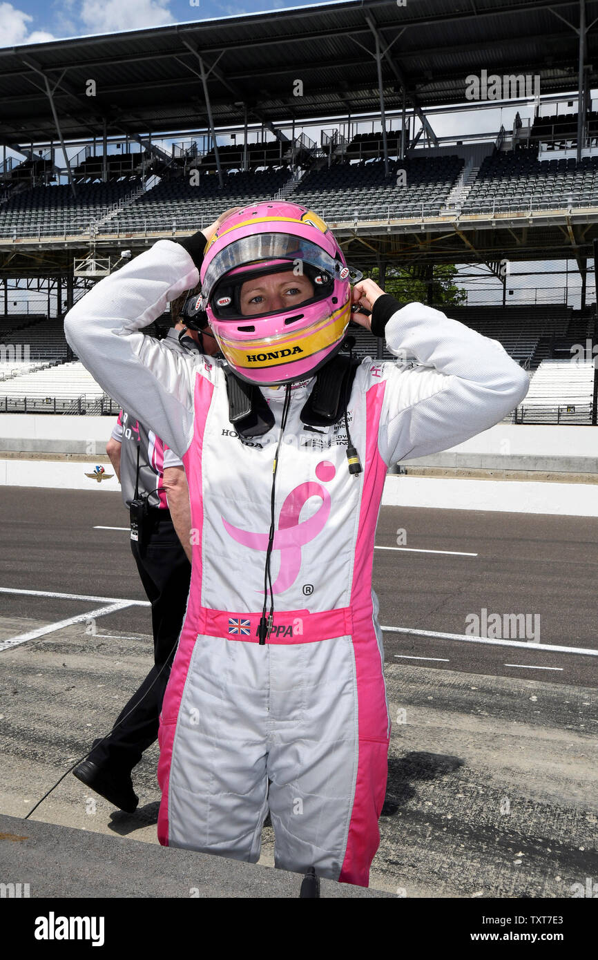 Pippa Mann dons her helmet in preparation practice during day 4 ...