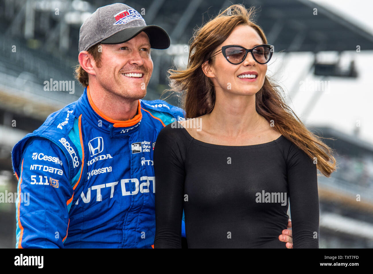 Scott Dixon and wife Emma watch the proceedings after Scott posted the ...