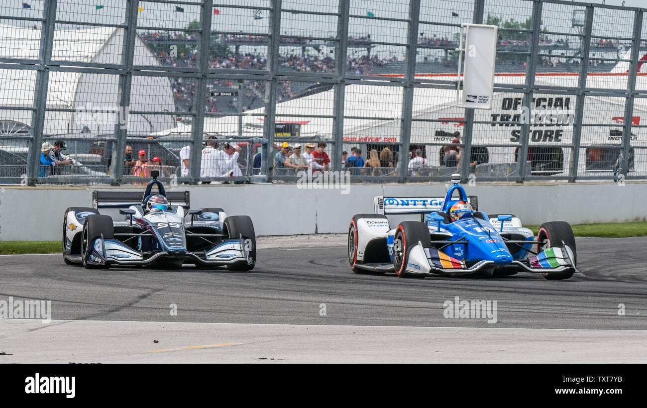 Max Chilton (59) goes wheel to wheel with Ed Jones in the IndyCar Grand ...