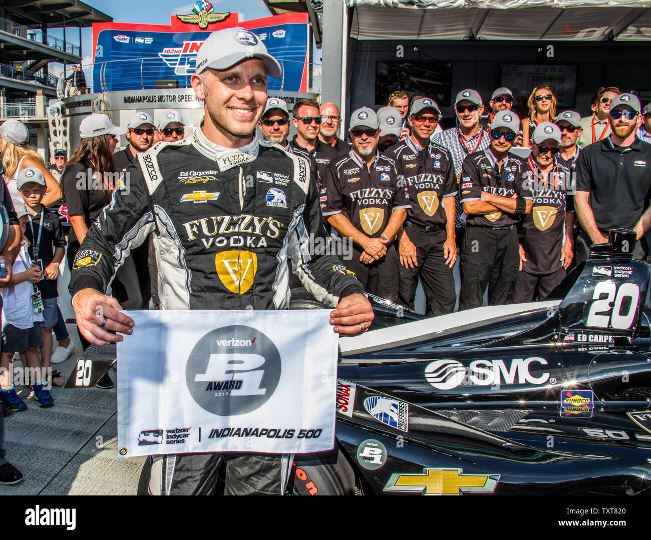 Ed Carpenter celebrates after winning the Pole Position for the 2018 ...