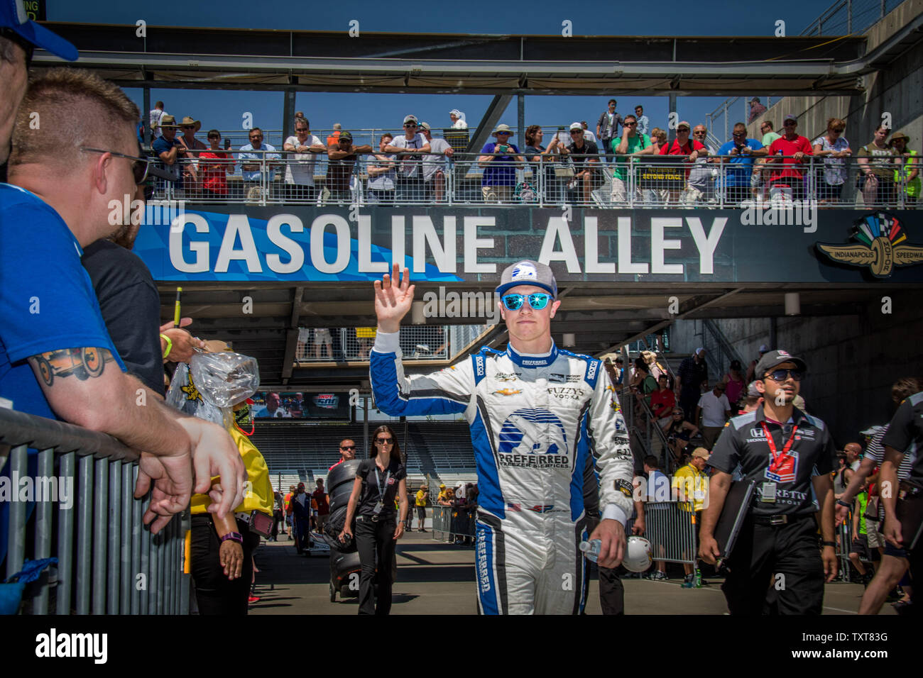 Spencer Pigot waves while leaving the track area after the final ...