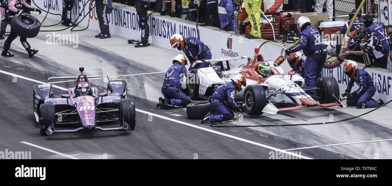 Jack Harvey (60) pulls out of the pits ahead of Conor Daly (17) during ...