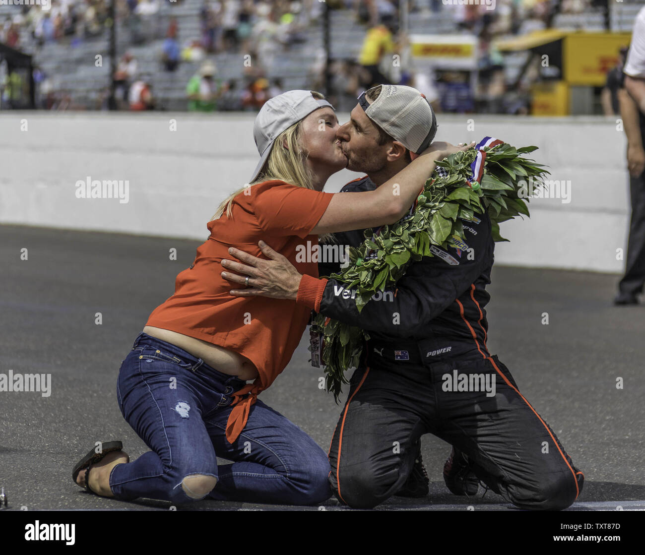 Will Power kisses his wife Liz after they kissed the bricks after he ...