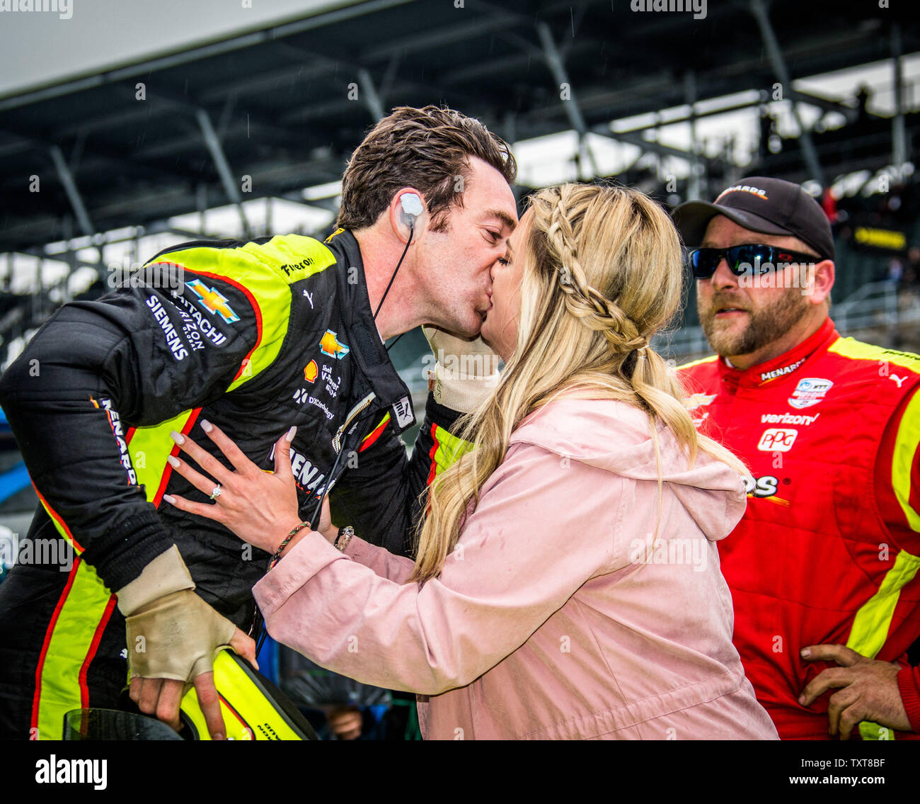 Simon Pagenaud celebrates with a kiss from longtime girlfriend Hailey ...