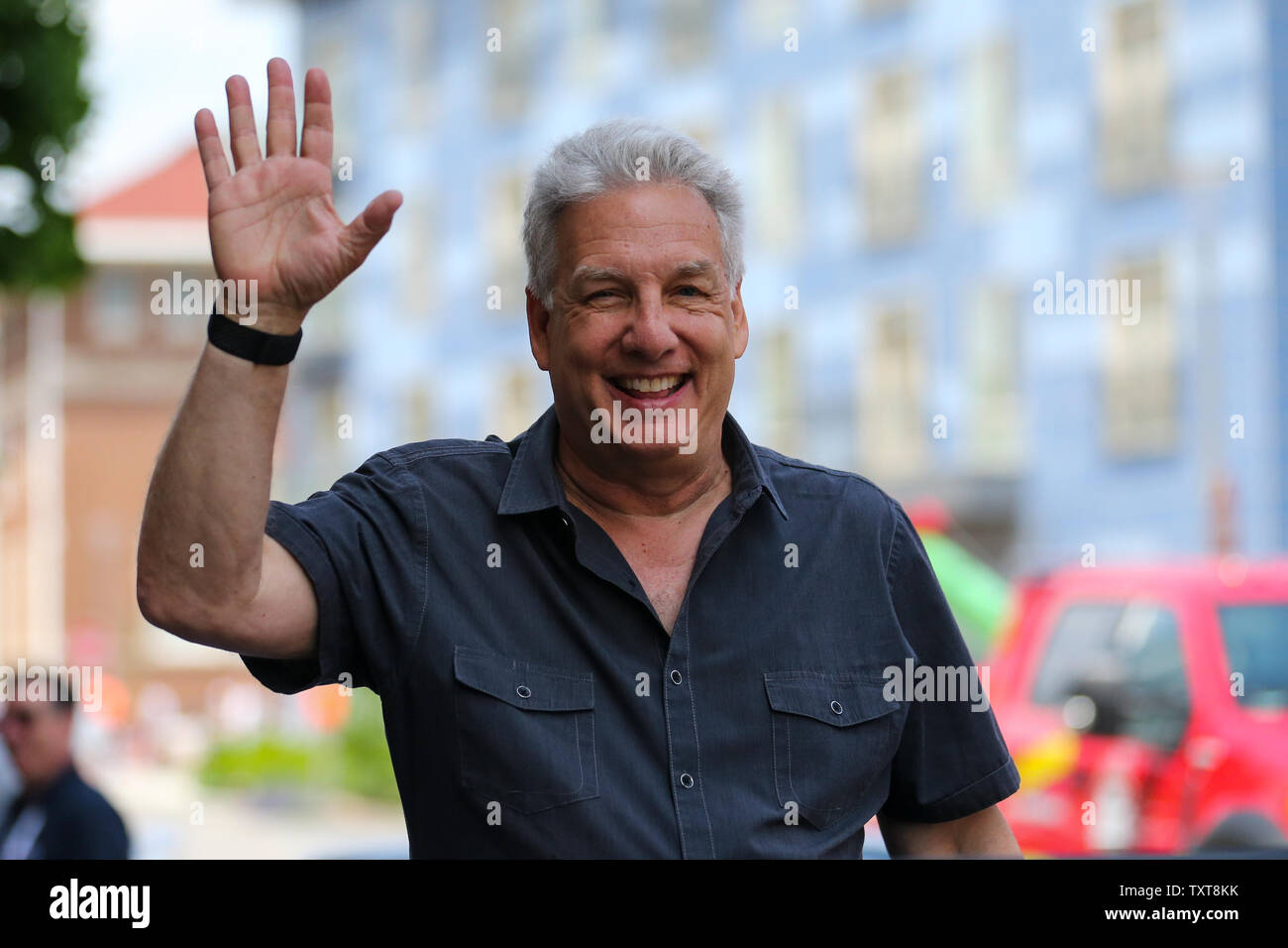 Mark Summers, from Double Dare, waves to the crowd in the IPL 500 ...