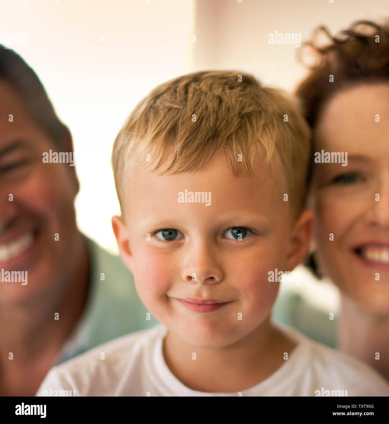 Portrait of little boy with his parents Stock Photo - Alamy
