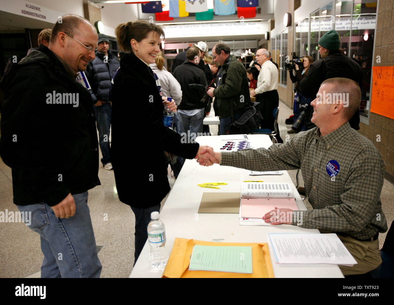 Republican Party precinct leader Troy Mapes (R) greets Jeff and ...