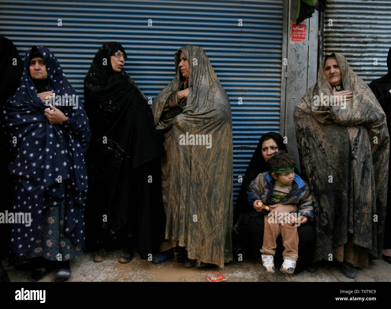 Iranian women covered in mud attend the Ashura religious festival in ...