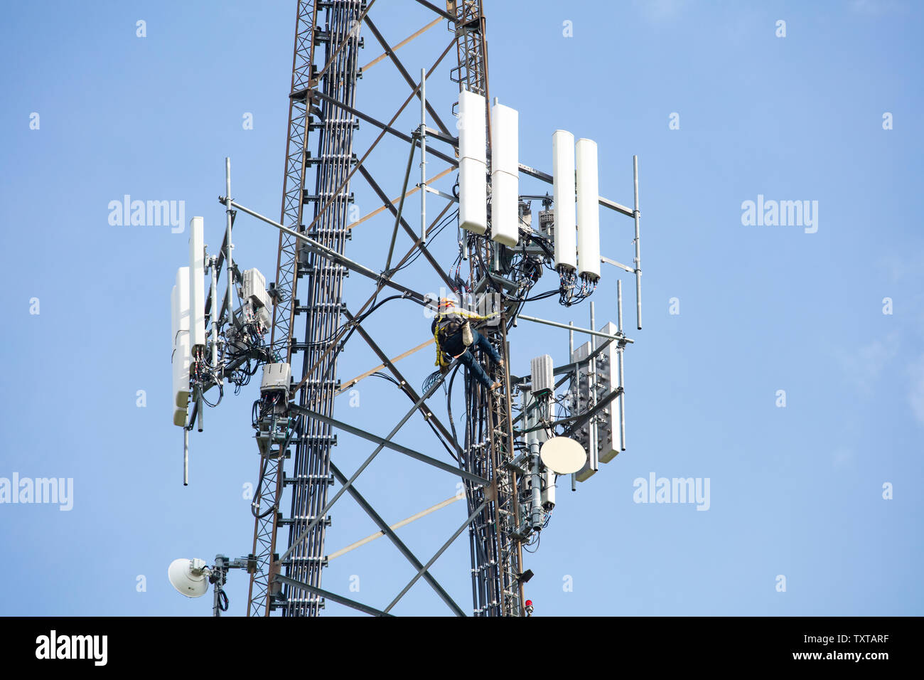 Cell tower repair hi-res stock photography and images - Alamy
