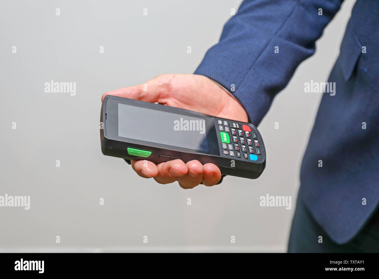Man Holding Handheld Barcode Scanner Reader Portable Computer Stock ...