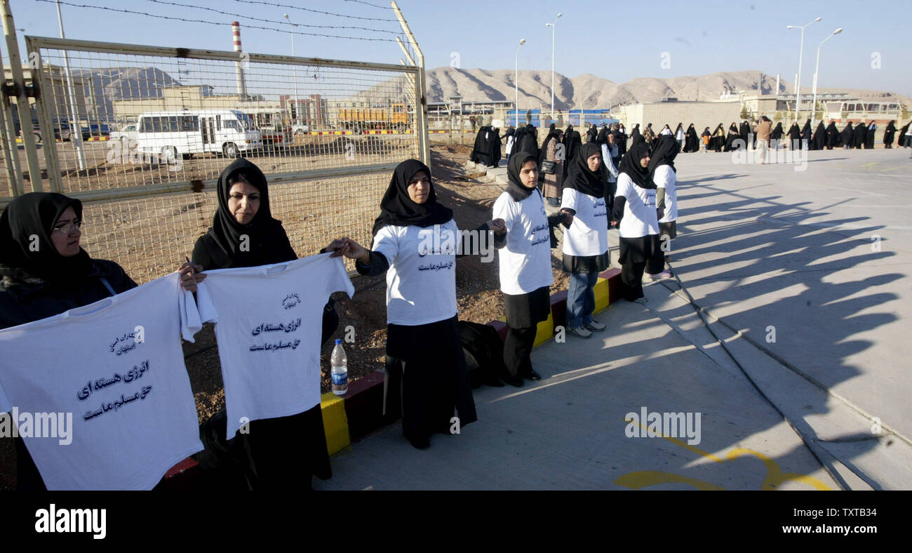 Iranian women athletes form a human chain around the Isfahan Uranium ...