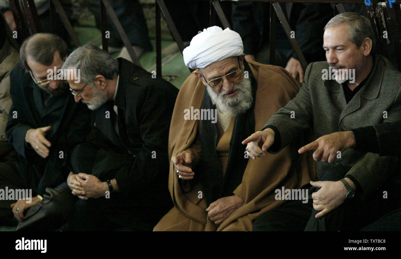 Iran's top nuclear negotiator Ali Larijani (L) talks to Iran's former ...
