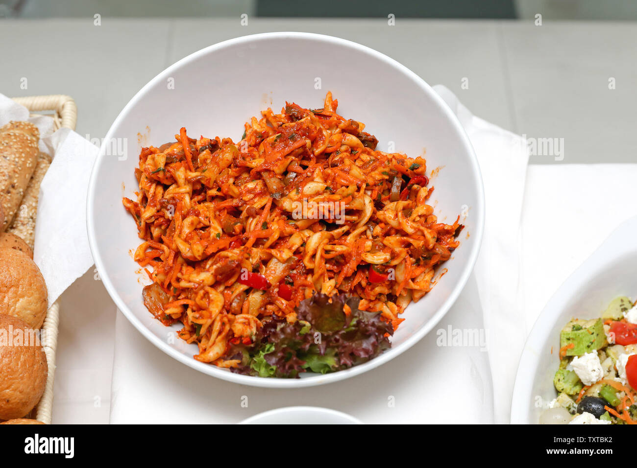 Italian Cuisine Red Pasta Meal in Bowl Stock Photo - Alamy