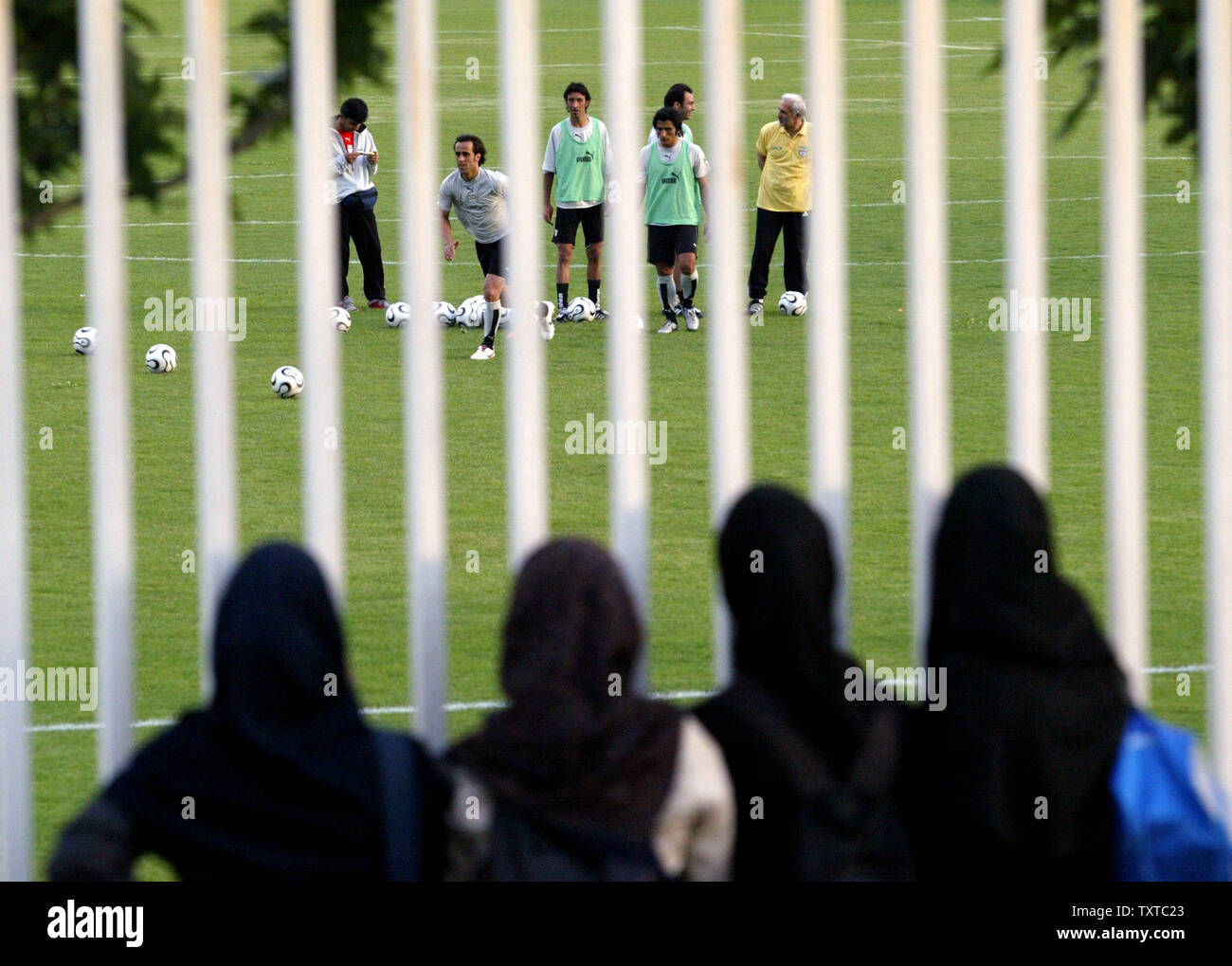 Iran's national soccer team players exercise in their camp as some ...