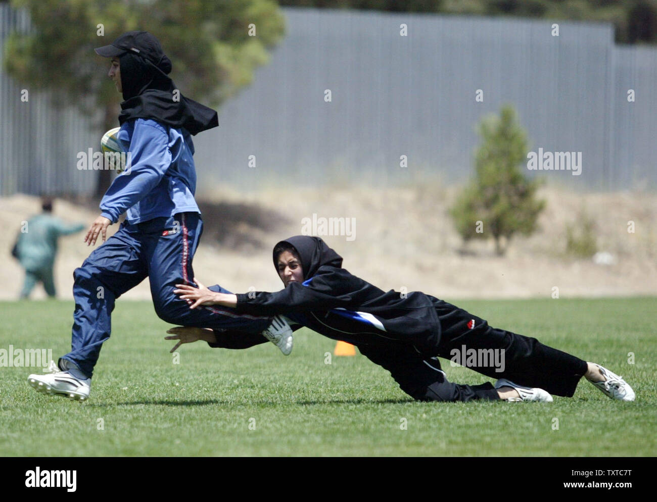 Iranian women rugby players train in Azadi (freedom) Sport Complex in ...
