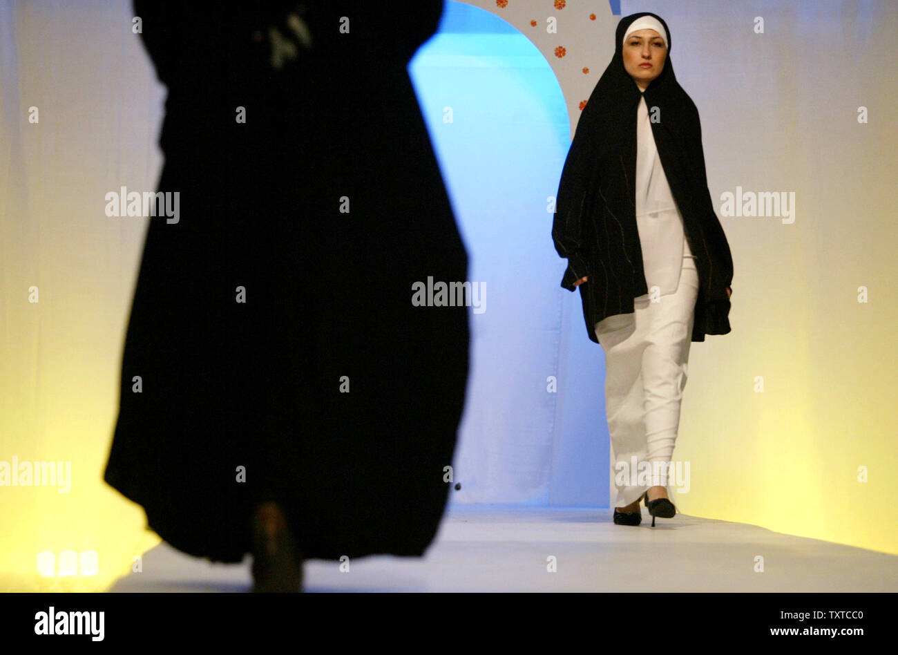 Iranian models wear Islamic dresses made by Iranian designers during a ...