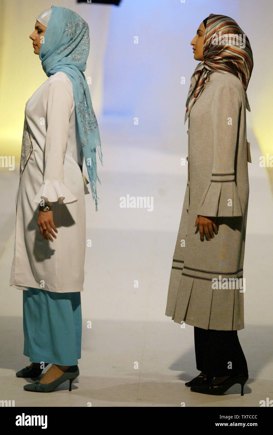 An Iranian model wears an Islamic dress made by Iranian designers at a ...