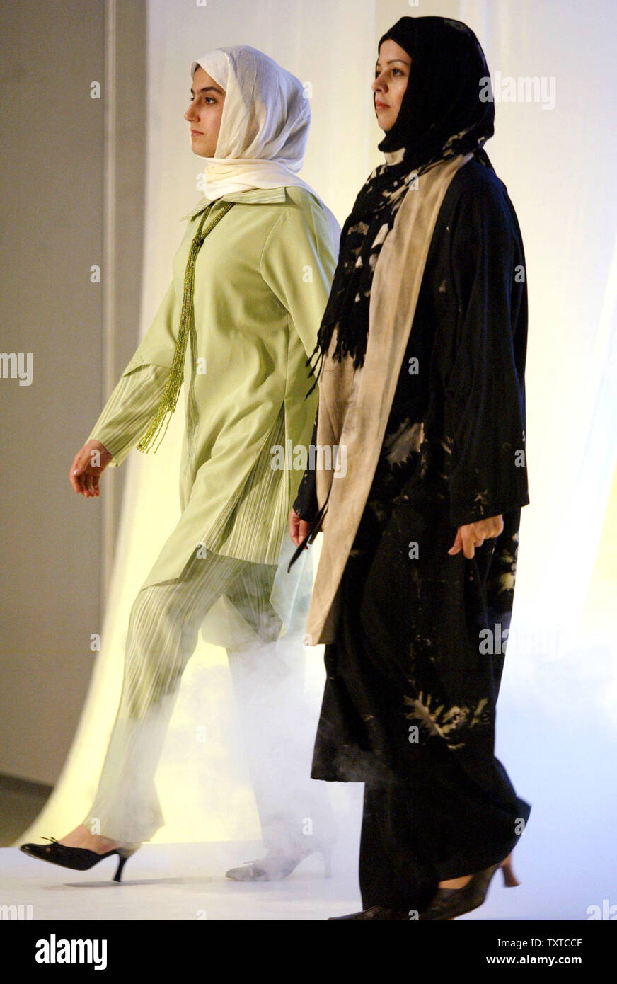 Iranian models wear Islamic dresses made by Iranian designers at a ...