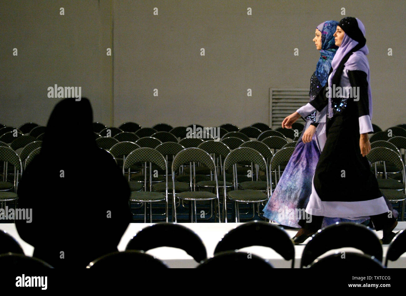 Iranian models wear Islamic dresses made by Iranian designers at a ...