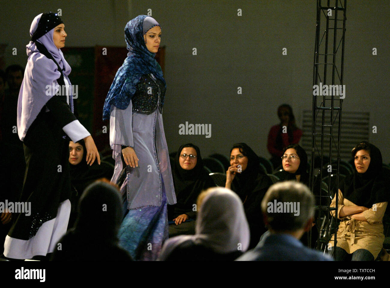 Iranian models wear Islamic dresses made by Iranian designers at a ...
