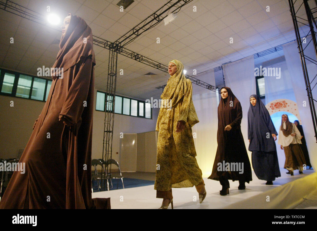 Iranian models wear Islamic dresses made by Iranian designers at a ...