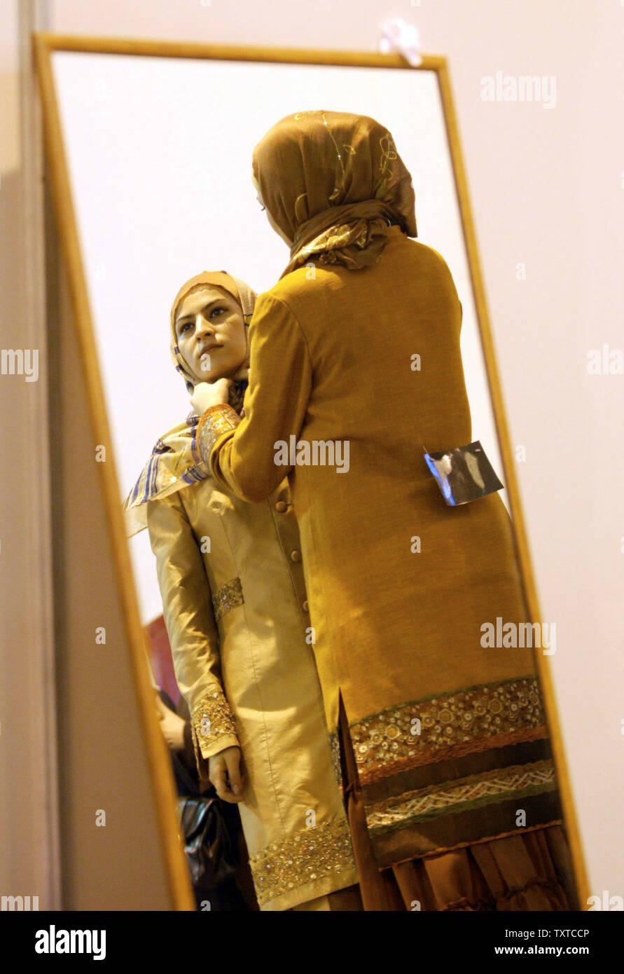 An Iranian model wears an Islamic dress made by Iranian designers at a ...