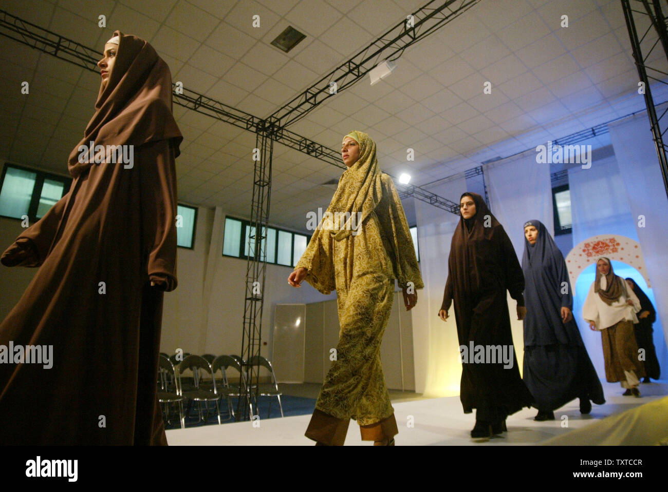 Iranian models wear Islamic dresses made by Iranian designers at a ...