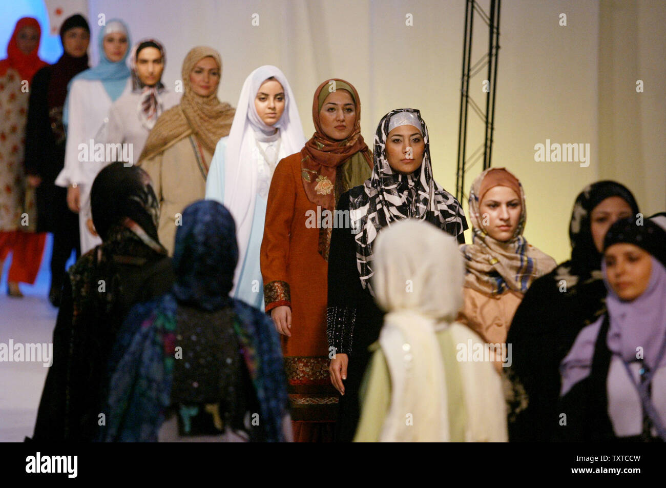 Iranian models wear Islamic dresses made by Iranian designers at a ...