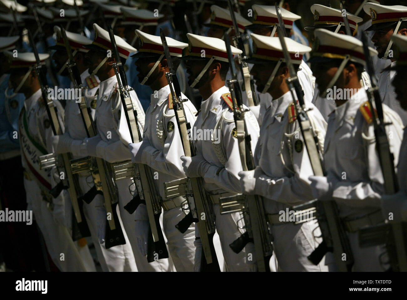 Iranian soldiers stand guard during an official welcoming ceremony for ...