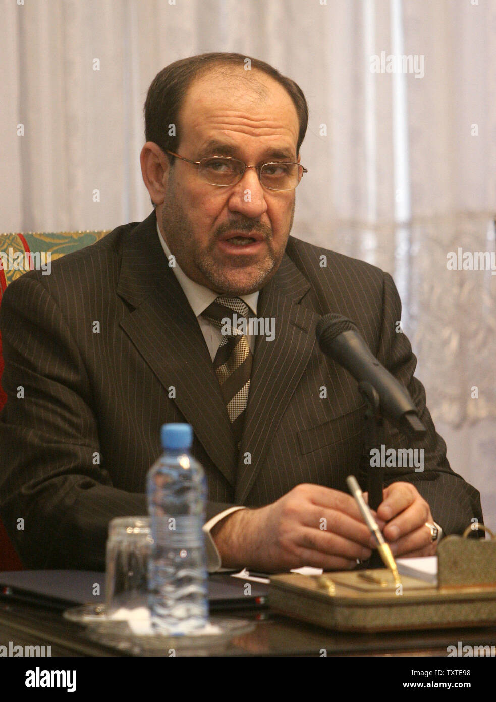Iraqi Prime Minister Nouri al-Maliki speaks during his press conference ...