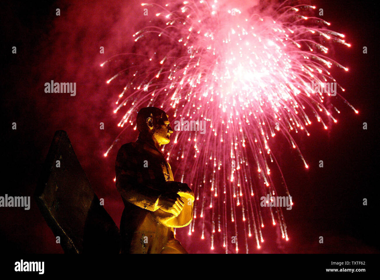 Fireworks are displayed behind statue of martyr Abbas Babaie, who was ...