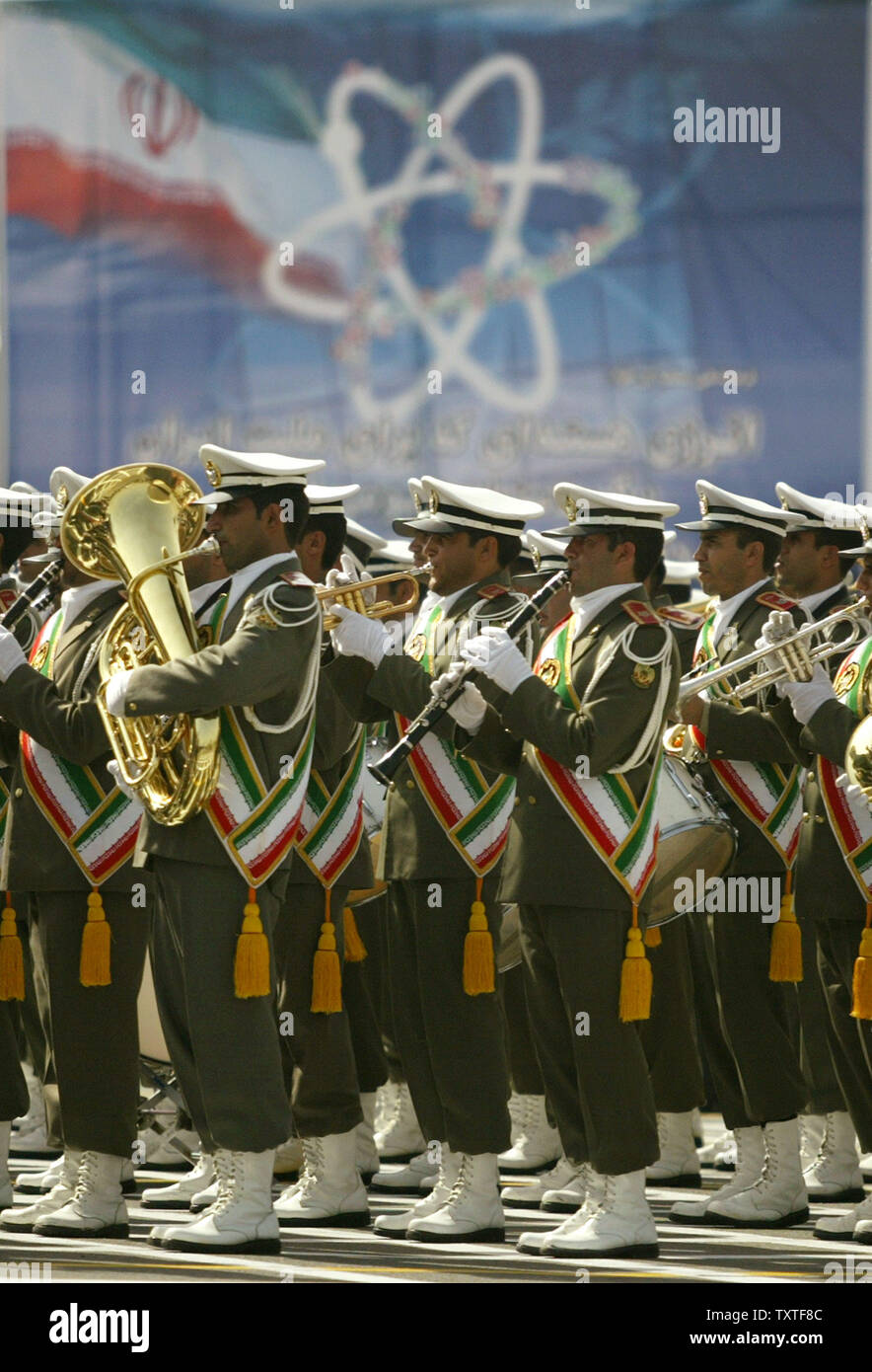 Iranian Army soldiers march under a nuclear banner during Iran's Army ...