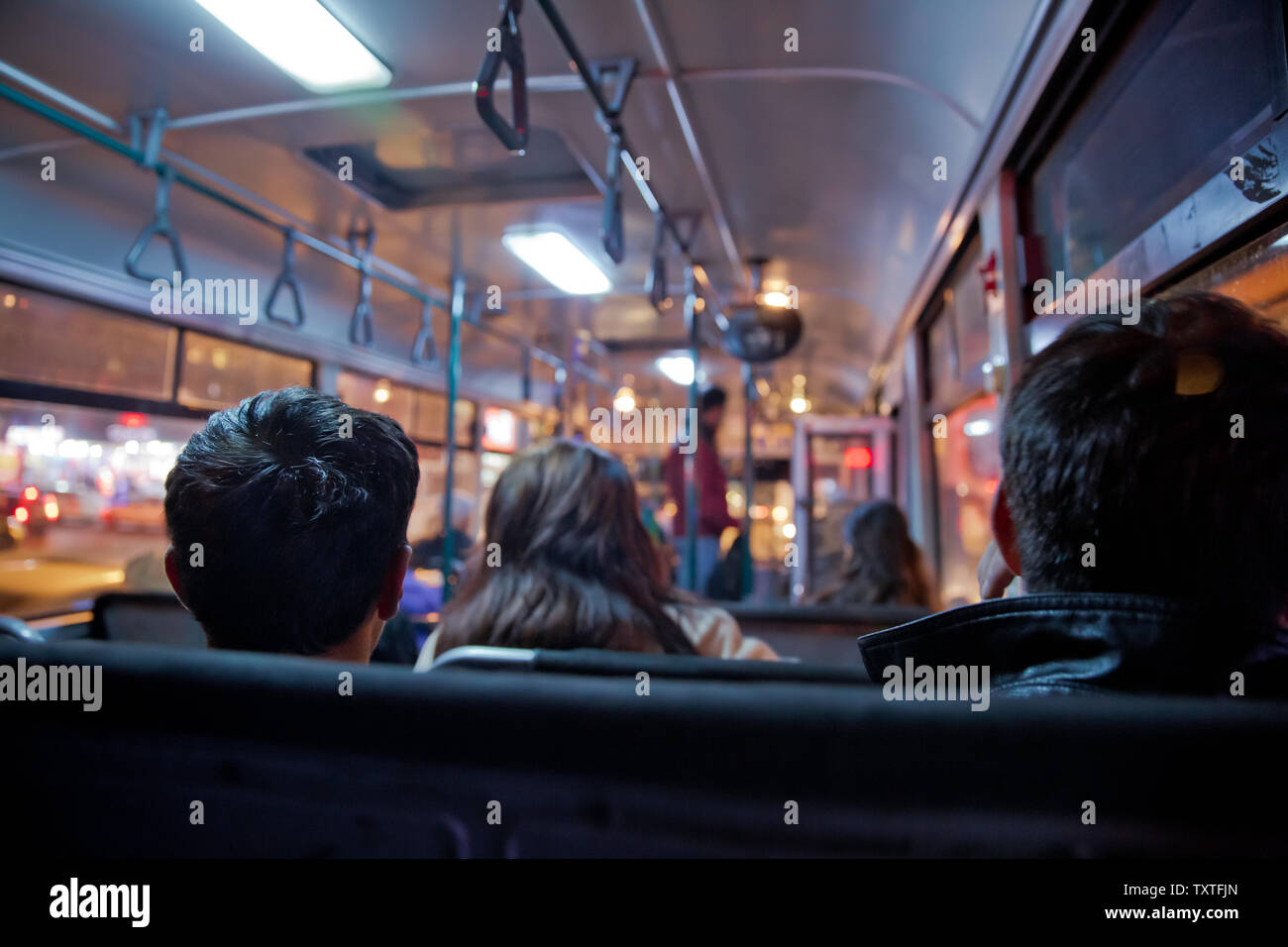 People sitting on a comfortable bus in Selective focus and blurred ...