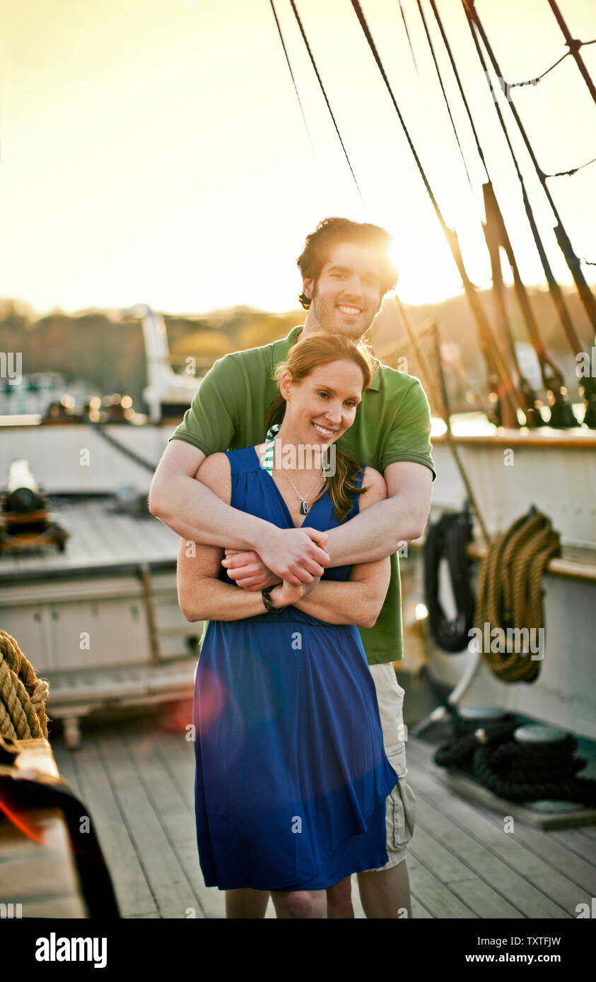 Married couple standing together on ship's deck Stock Photo - Alamy