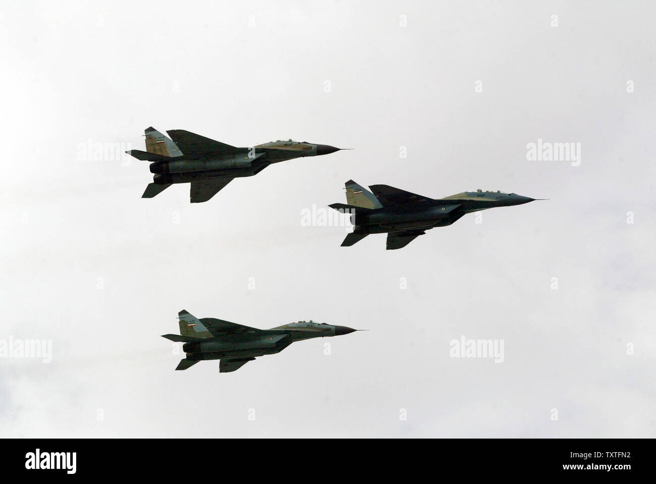 Jet fighters of the Army's air force conduct a major fly-by over the ...