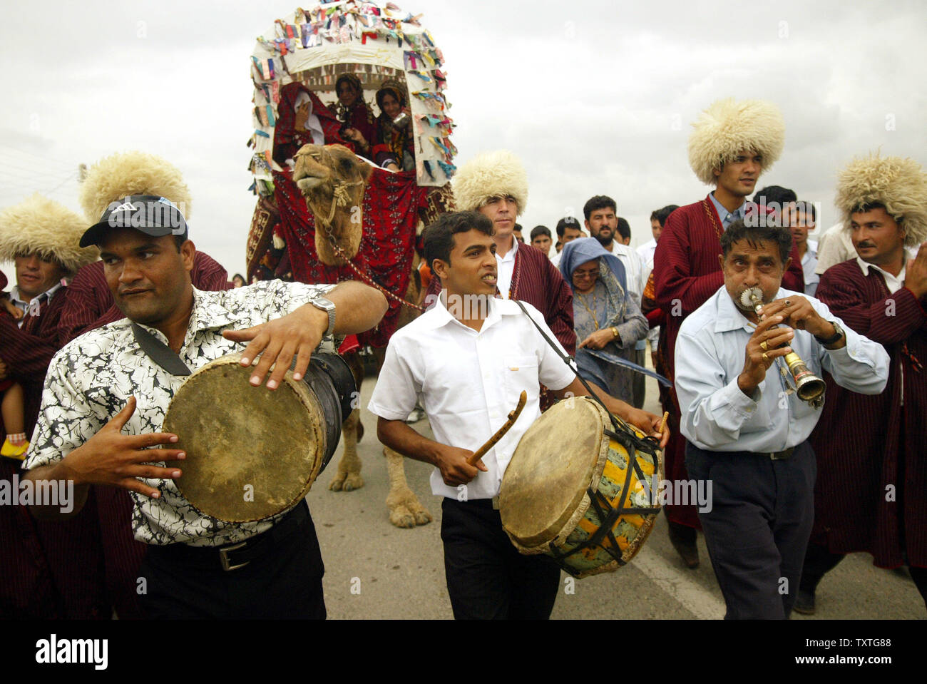 A Sunni Iranian band plays while groom Yaghoub Tan, 29 (C), pulls the ...
