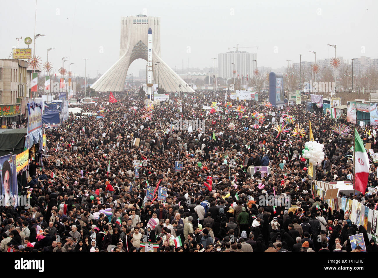 Iranians attend a rally marking the 30th anniversary of Iran's Islamic ...