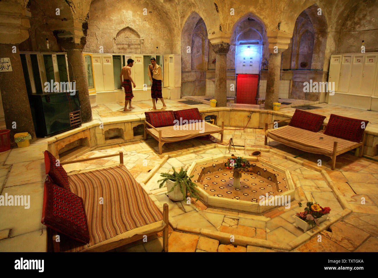 Iranian men dry them selves in a traditional bath known as Hamam-e-Safa ...