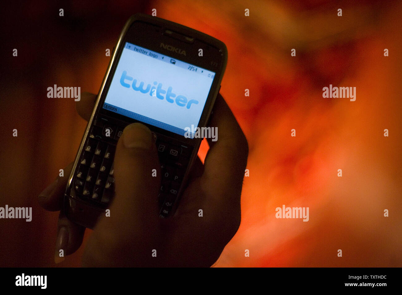 A twitter logo is seen on a cell phone screen in Tehran, Iran on June ...