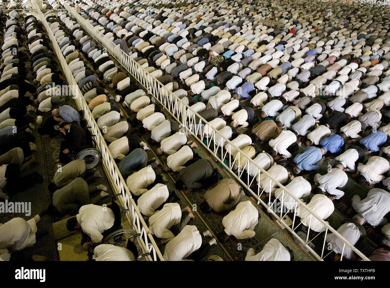 Iranian worshippers pray during Friday Prayer at Tehran University ...