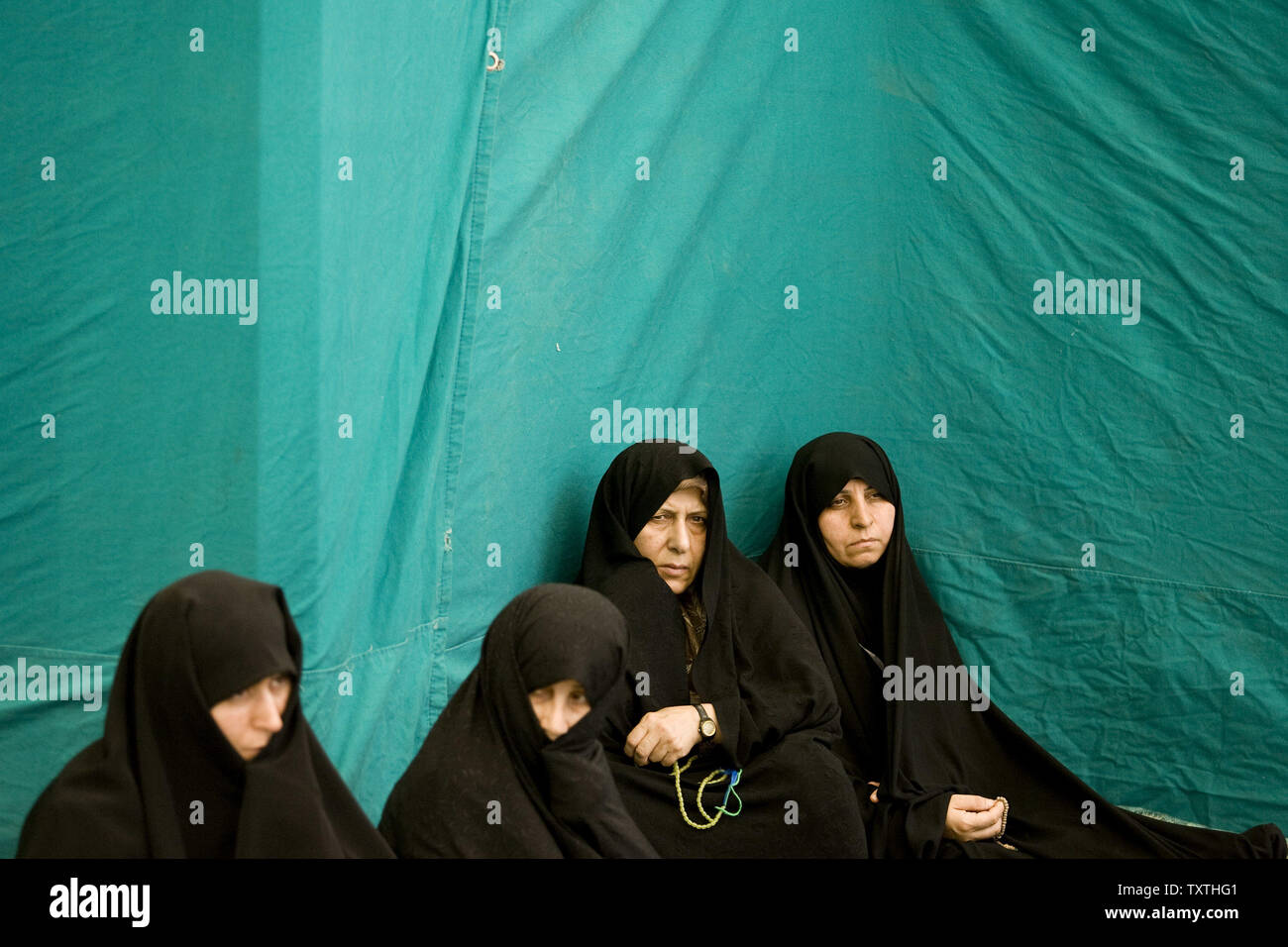Iranian women pray as they attend Friday Prayer at Tehran University ...