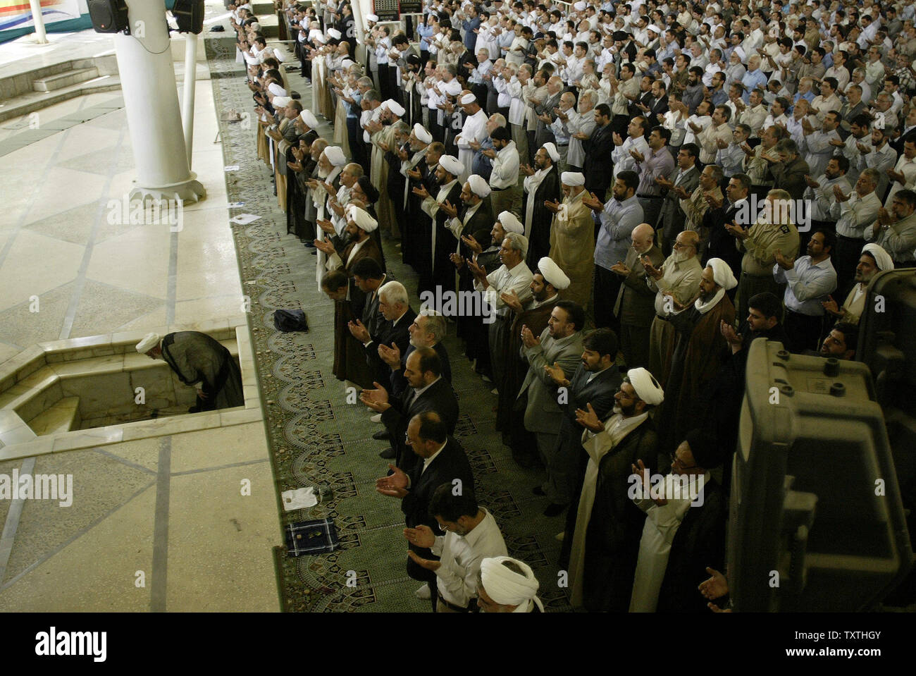 Iranian cleric Ahmad Janati (L), who chairs the powerful Guardians ...