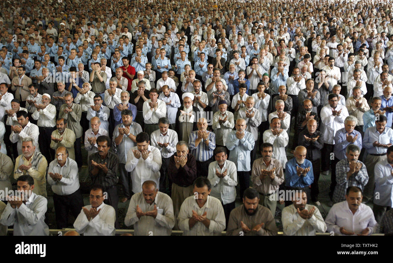 Iranian worshipers pray during Friday Prayer at Tehran University ...