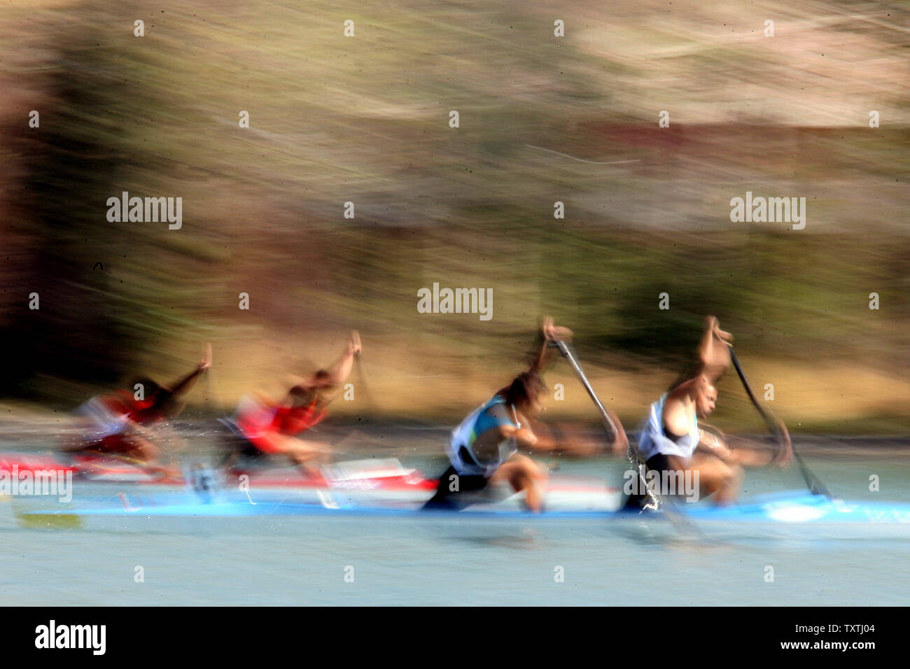 Male rowers race during the Asian Canoe Sprint Junior Championships in ...