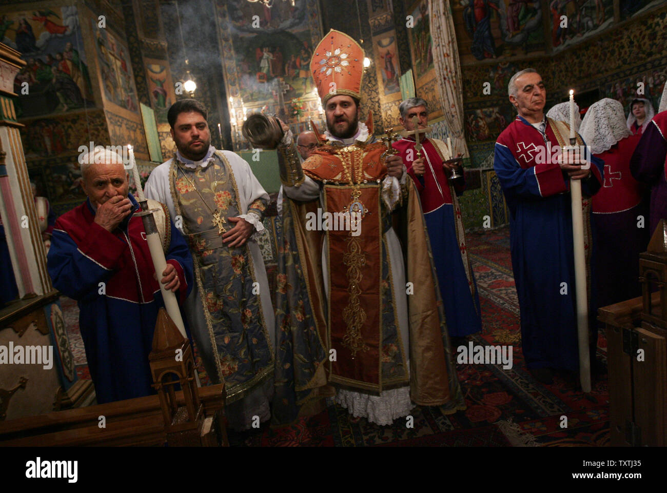 A priest leads a church service for Iranian Christians on the first day ...
