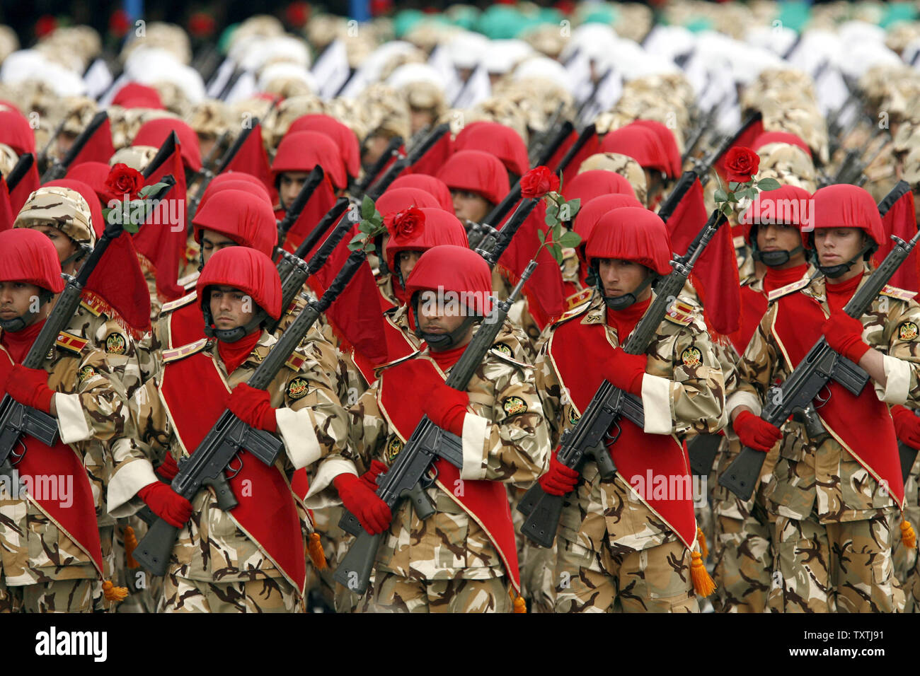 Iranian soldiers march during a military parade marking the annual ...