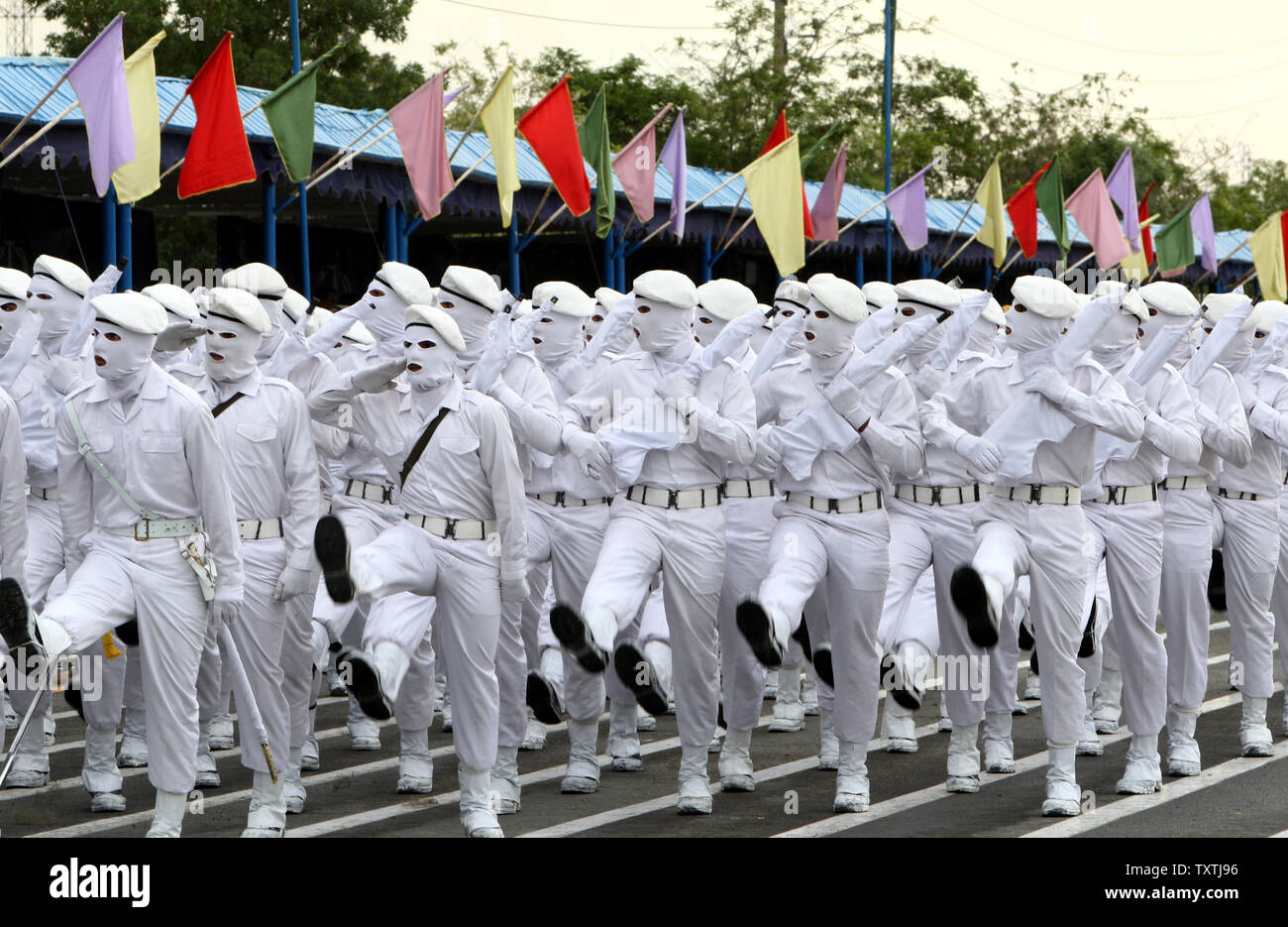 Iranian soldiers march during a military parade marking the annual ...