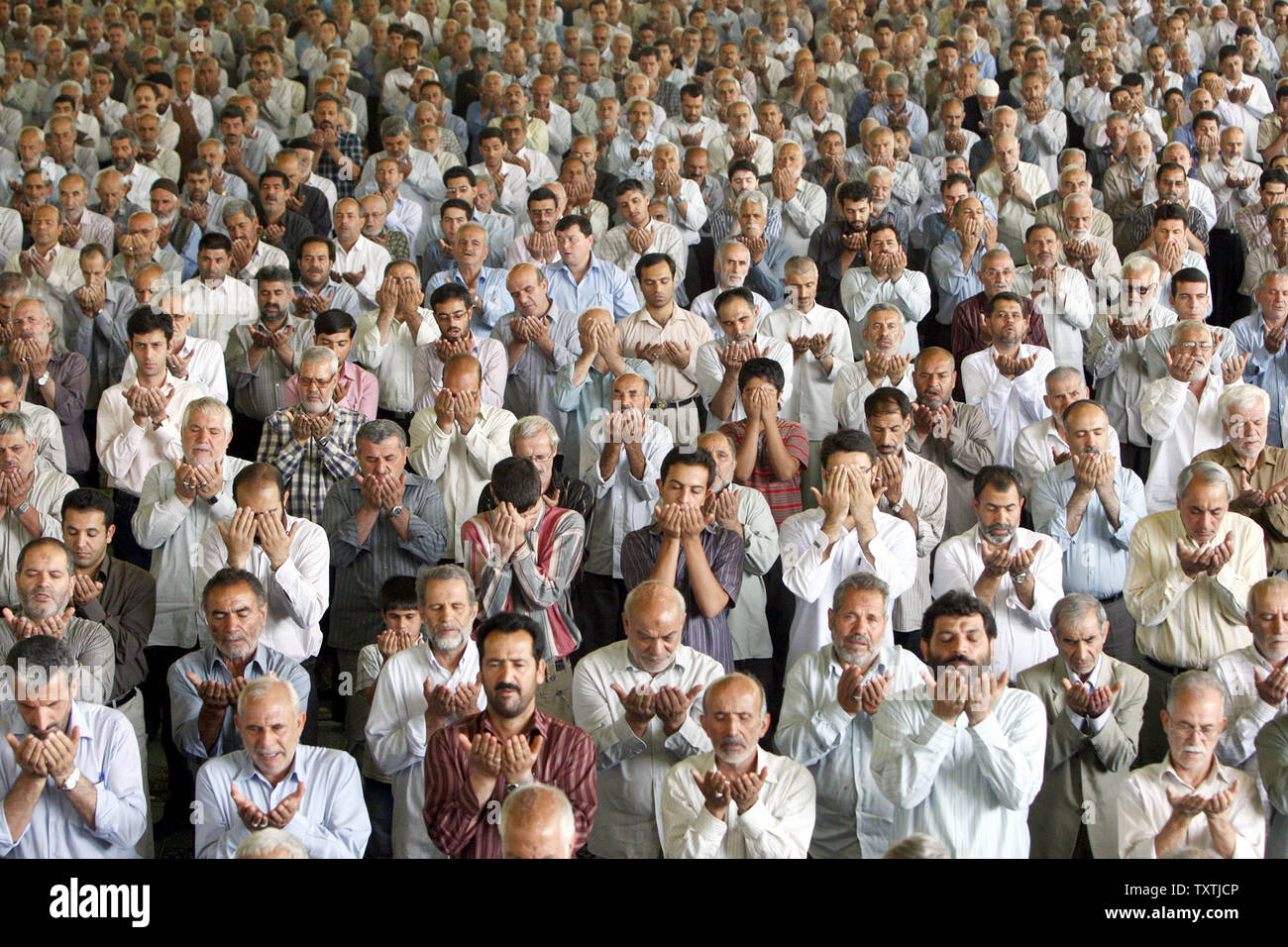 Iranian worshipers pray during Friday prayers in Tehran University on ...